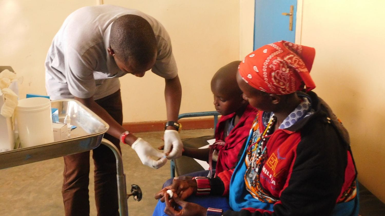Mother and child getting HIV tests done – Land and Life Foundation